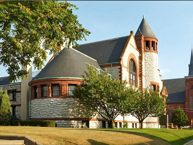 The Hoyt Library's castle-like exterior houses literary treasures instead of royal jewels, its stone walls protecting stories rather than gold.