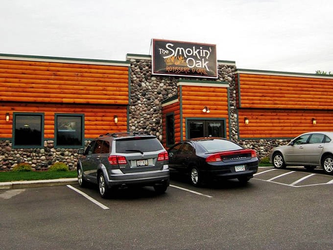The Smokin' Oak's rustic log cabin exterior hints at the wood-fired delights waiting inside this Red Wing favorite.