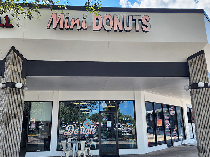 Van Dough's modern storefront with its clean lines and pink "Mini Donuts" sign brings style to the Clearwater donut scene.