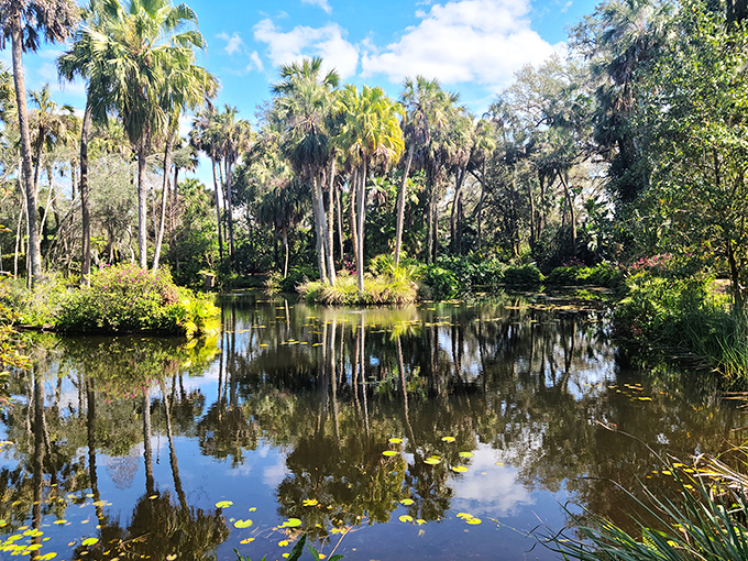 A tranquil reflecting pool mirrors the beauty of Bok Tower Gardens, creating a perfect symmetry that doubles the visual magic of this peaceful sanctuary.
