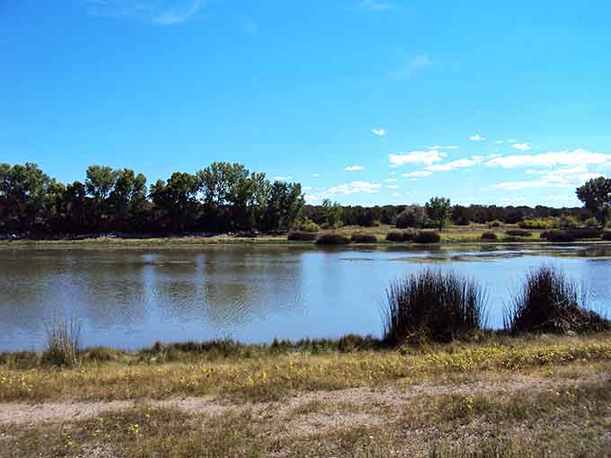 Tranquil waters reflect endless skies in high desert country where nature sets the pace.