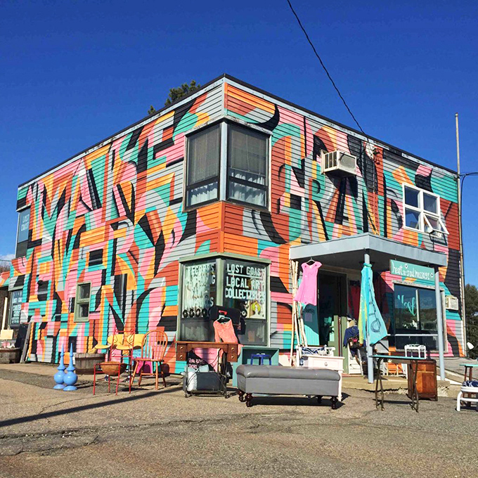 Kittery's colorful art scene bursts forth in this vibrant building covered in playful murals, housing local shops that celebrate Maine's creative spirit.