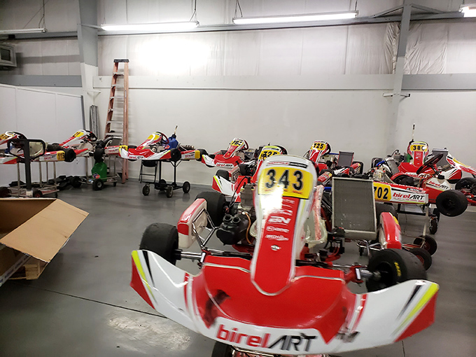 Racing fleet: The impressive lineup of Birel ART karts stands ready for action &ndash; each one meticulously maintained for optimal performance.