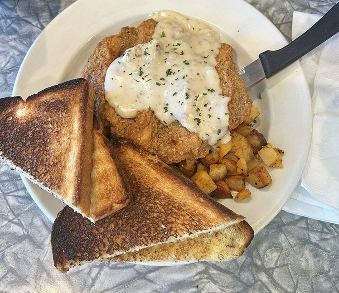Chicken fried steak swimming in sausage gravy is comfort food that doesn't apologize for being exactly what your grandmother would approve of, assuming she wasn't watching your cholesterol.