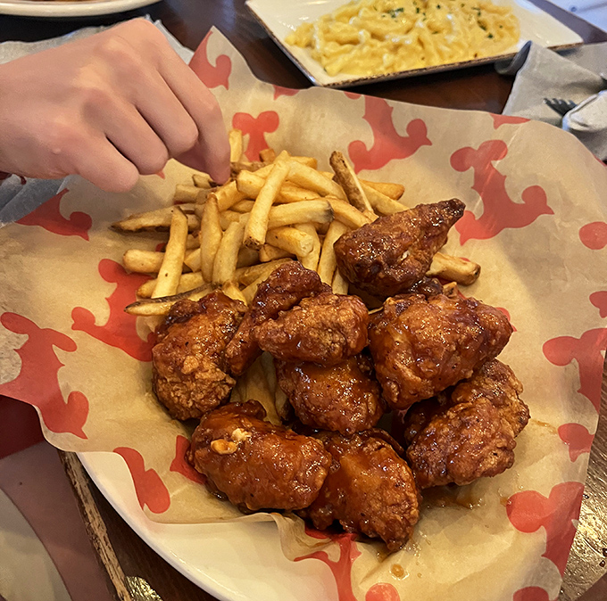 These aren't your average wings – they're flavor bombs disguised as chicken, glazed with a sauce that strikes the perfect balance between sweet and heat.