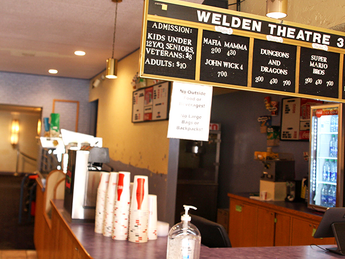 Where movie magic begins: the concession stand serves as the heart of the pre-show ritual, where decisions about snacks are made with delightful seriousness.