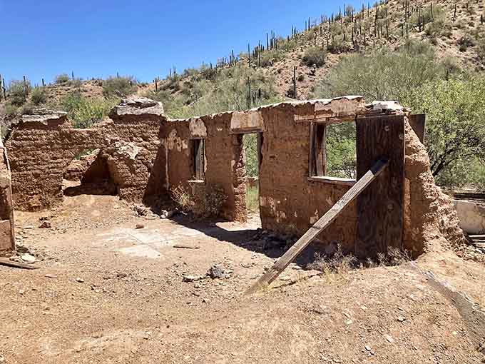 Crumbling adobe walls whisper stories of the workers who once called this remote desert outpost home, however temporarily.