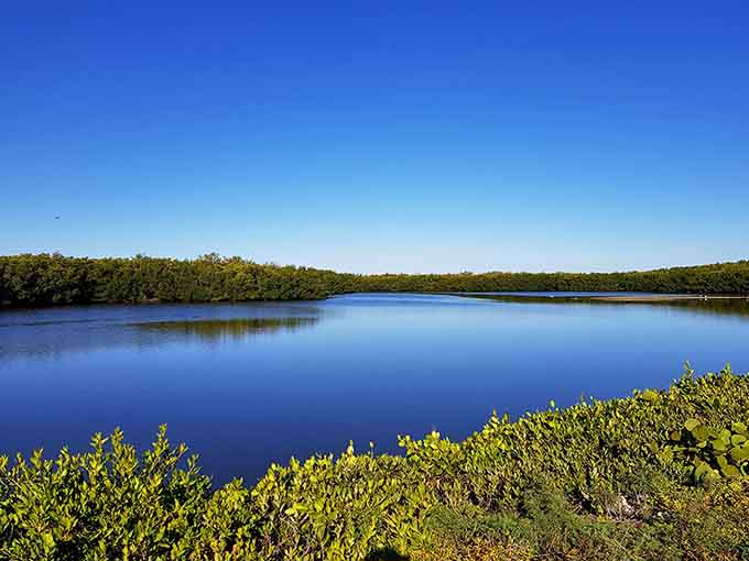 Water so calm it looks Photoshopped, except it's real and you can actually visit it without a screen.