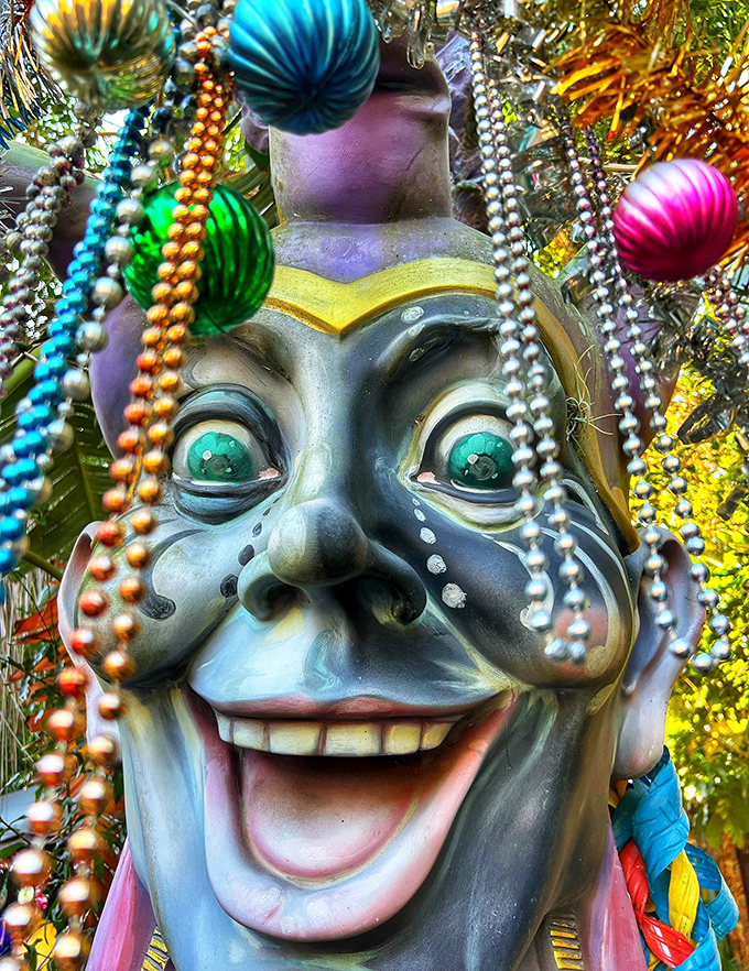 This grinning guardian's emerald eyes seem to follow you, his bejeweled visage capturing the fine line between whimsy and mild terror.