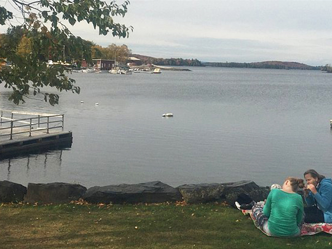 Simple pleasures: a quiet picnic by the shore while Moosehead's gentle waves provide the soundtrack to a perfect Maine afternoon.