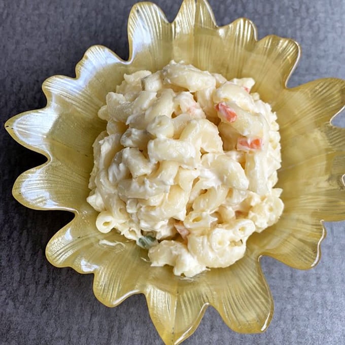 Never underestimate macaroni salad, this creamy Hawaiian staple is the supporting actor that steals every single scene it's in.