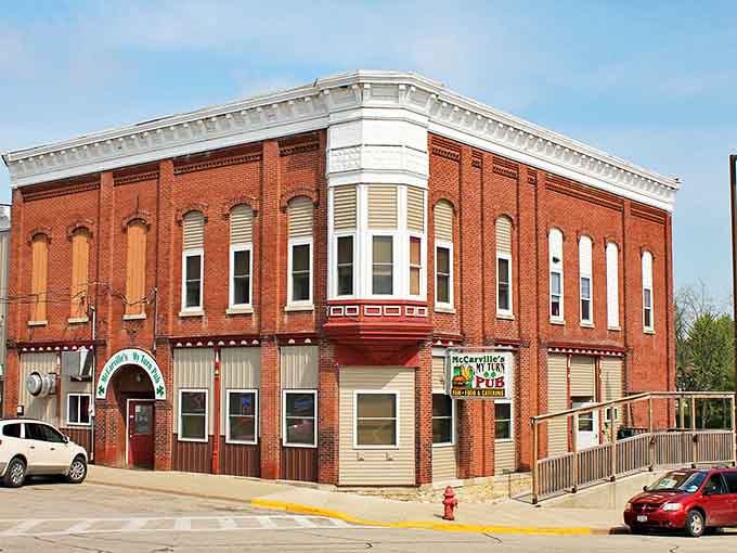 The Opera House Building stands proudly in its red brick glory, a reminder that culture finds its way even to the smallest corners of Wisconsin.