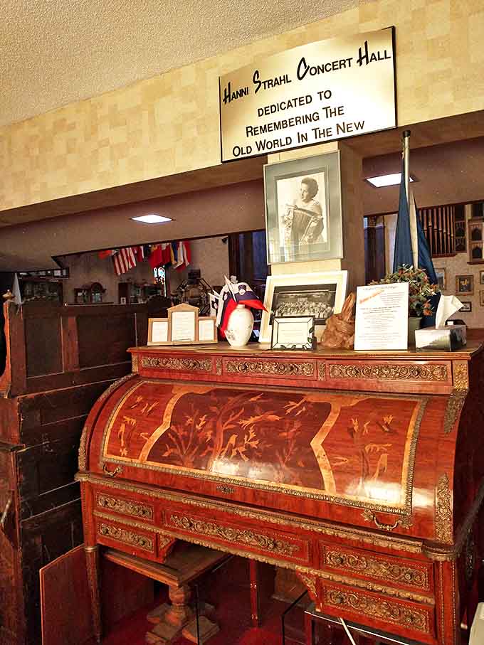This ornate rolltop desk serves as the centerpiece of a display honoring the administrative side of accordion history and culture.
