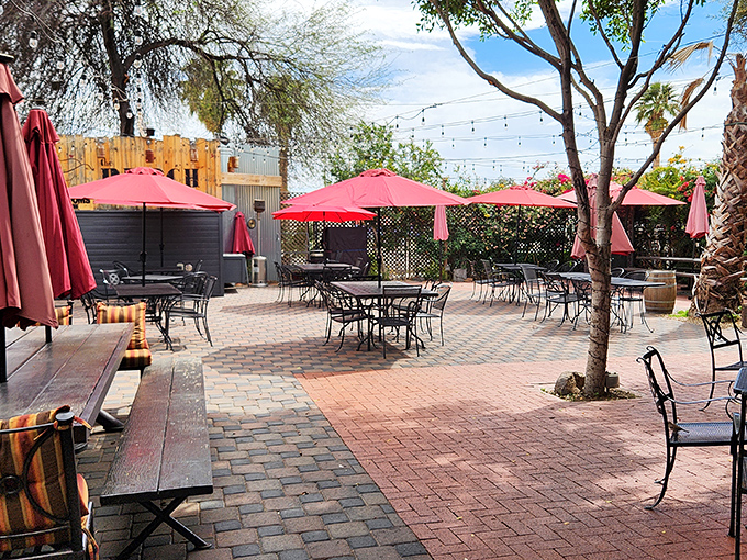 The outdoor dining area transforms into a magical retreat when Arizona's unforgiving sun finally sets, with string lights creating intimate ambiance.