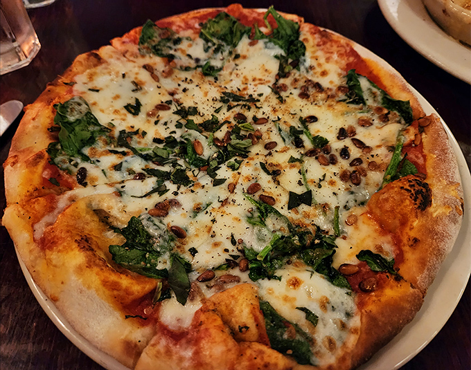 Pizza perfection from the wood-fired oven &ndash; that char on the crust is the culinary equivalent of a perfect sunset.