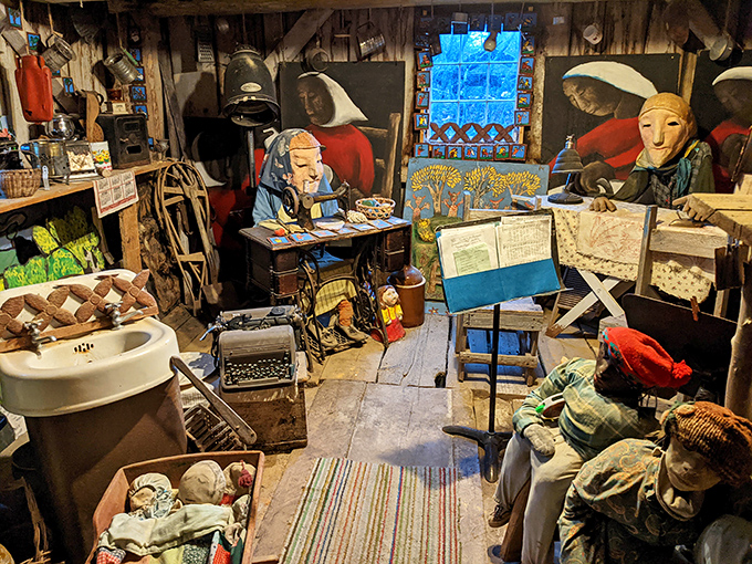 A theatrical diorama where puppets live their best lives, surrounded by vintage typewriters and stained glass windows filtering Vermont sunlight.