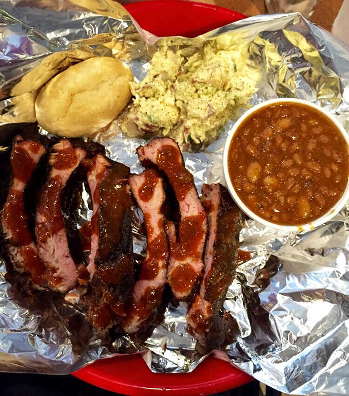 These ribs don't just fall off the bone, they practically leap into your mouth, leaving behind nothing but sticky fingers and happy memories.