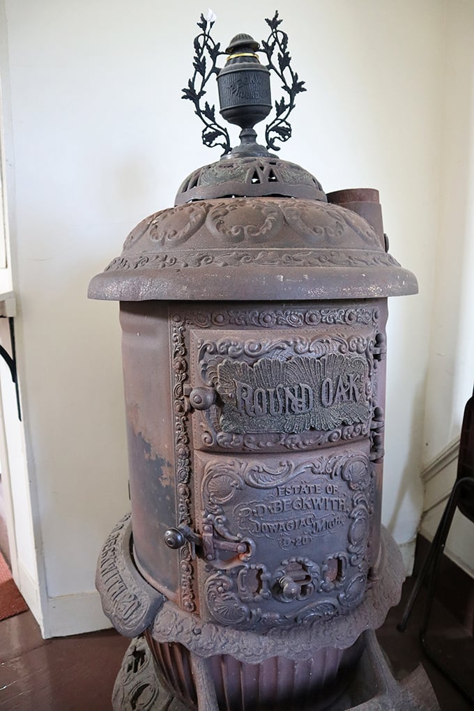 This ornate Round Oak stove once warmed parishioners during frigid Vermont winters, its cast iron details showcasing 19th-century craftsmanship.