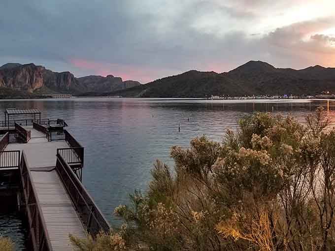 The boardwalk at sunset turns into prime real estate for watching the sky put on its nightly color show over the peaceful water.