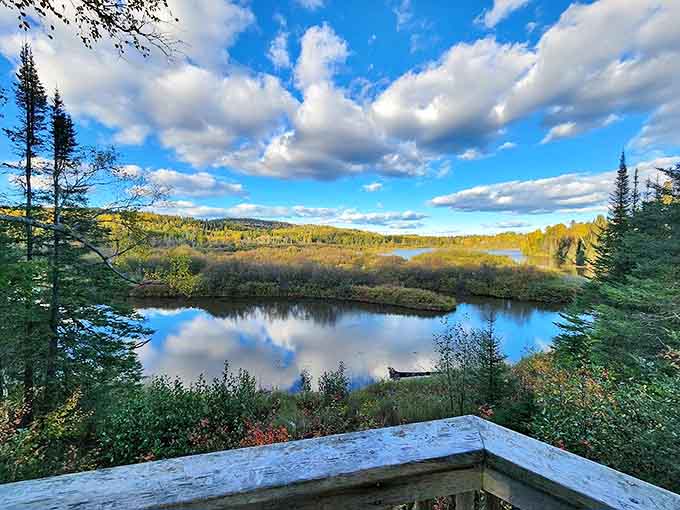 Mirror-like waters reflect Minnesota's big sky country, doubling the visual feast in a landscape that feels impossibly vast yet intimately connected.