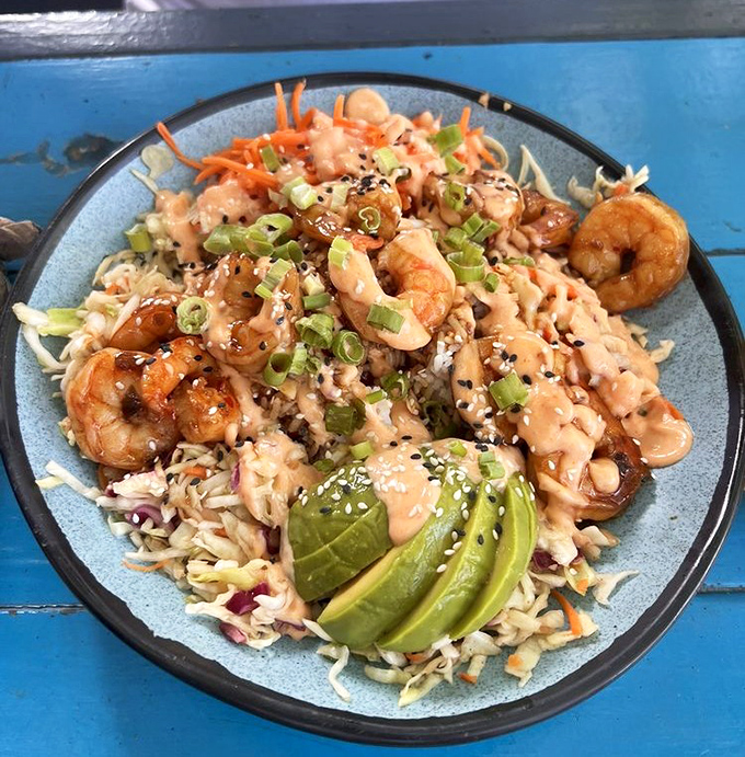 This shrimp poke bowl is a vacation in every bite &ndash; glazed shrimp, fresh vegetables, and avocado slices creating a colorful flavor explosion.