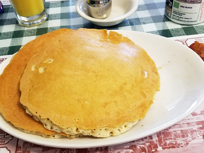 Simple perfection on a plate &ndash; sometimes the classic pancake needs no embellishment beyond butter and syrup.