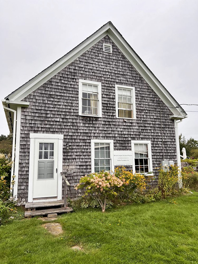 The shingled studio building houses smaller works and provides insight into the creative process behind the outdoor masterpieces.
