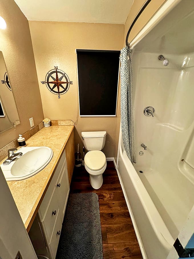 Bathroom featuring the holy trinity of glamping: running water, actual toilet, and no spiders plotting ambushes.