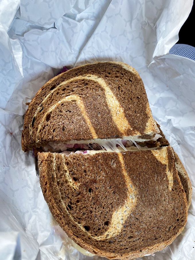 A Turkey Reuben that would make any deli proud, served on marble rye with the perfect balance of meat, cheese, and tangy dressing.