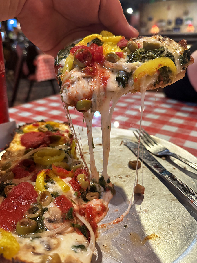 Veggie lovers rejoice! This colorful medley proves plant-based toppings deserve just as much respect on Detroit's signature square crust.