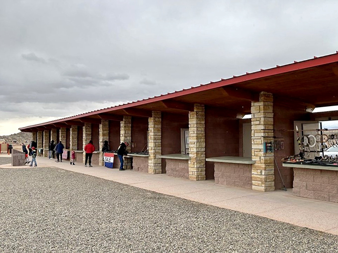 Vendor stalls line the monument plaza, where Navajo artisans showcase generations of craftsmanship and cultural heritage.