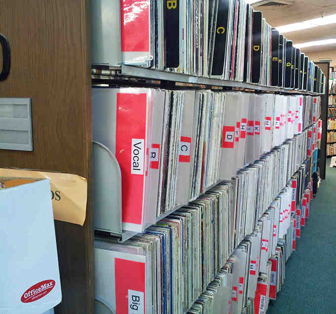 Vinyl enthusiasts can lose themselves among these meticulously organized records, where forgotten albums wait to be rediscovered by appreciative ears.