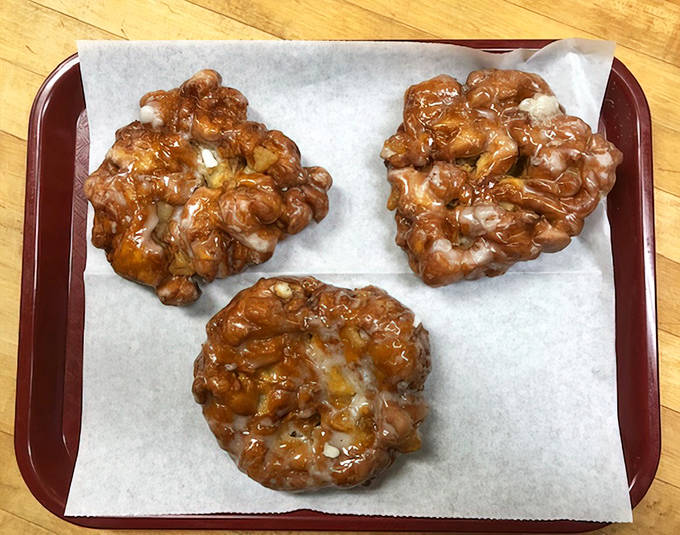 These apple fritters aren't just pastries &ndash; they're monuments to the perfect marriage of apples and dough. Diet plans tremble at their very sight.