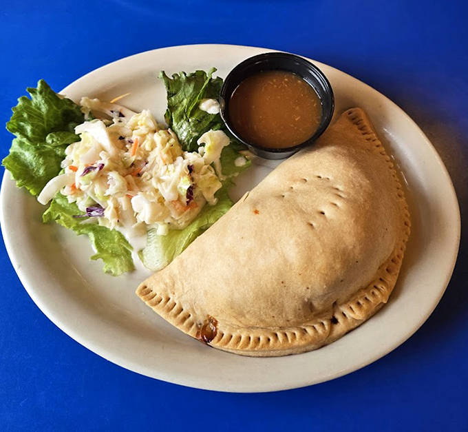 This golden-crusted pocket of deliciousness comes with a side of coleslaw that's anything but an afterthought.