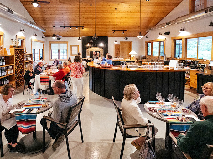 Where memories are made: Guests gather around the circular bar, each table hosting conversations that flow as freely as the wine.