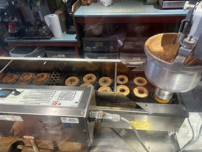 Donut magic in motion! Watch hypnotically as rings of batter transform into golden circles of happiness before your very eyes.