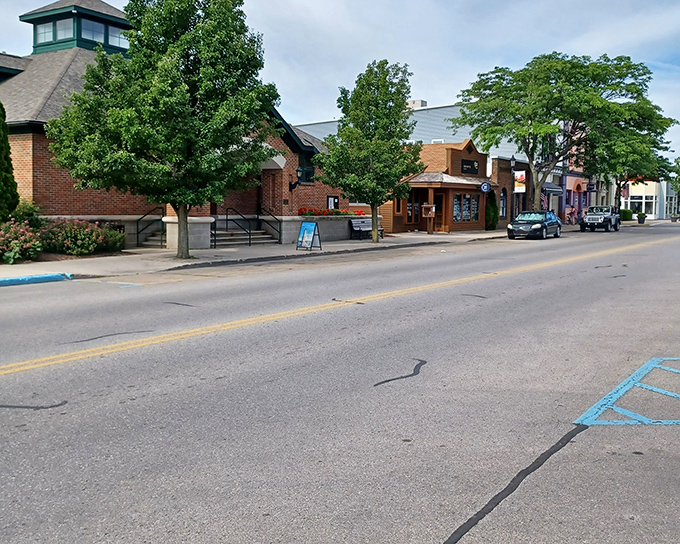 The Garden Theater's vintage marquee lights up downtown Frankfort, promising entertainment the old-fashioned way.