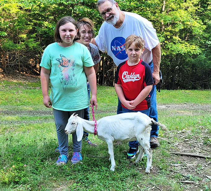 Family adventure with goats creates unplugged quality time, where smartphones stay pocketed and real-world connections take priority.