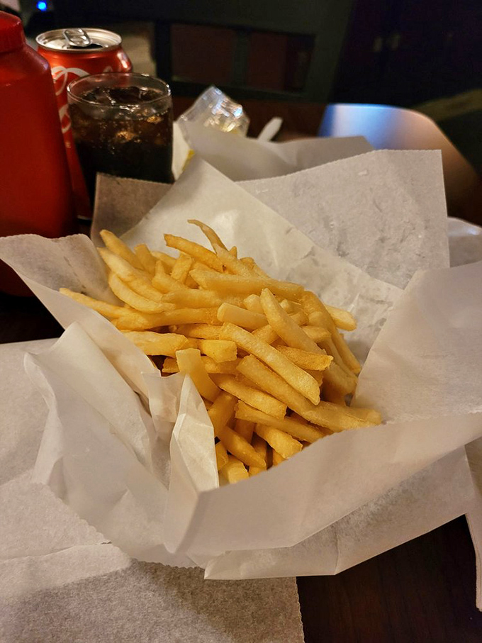 Golden, crispy french fries served in a simple basket. The perfect companion to what might be Michigan's most famous burger.