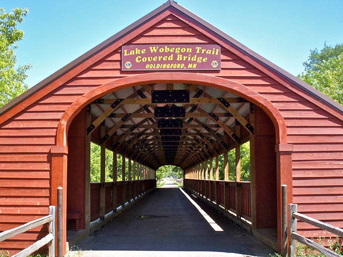 Front view The bridge stands like a portal to another time, its entrance framing whatever adventure awaits on the other side.
