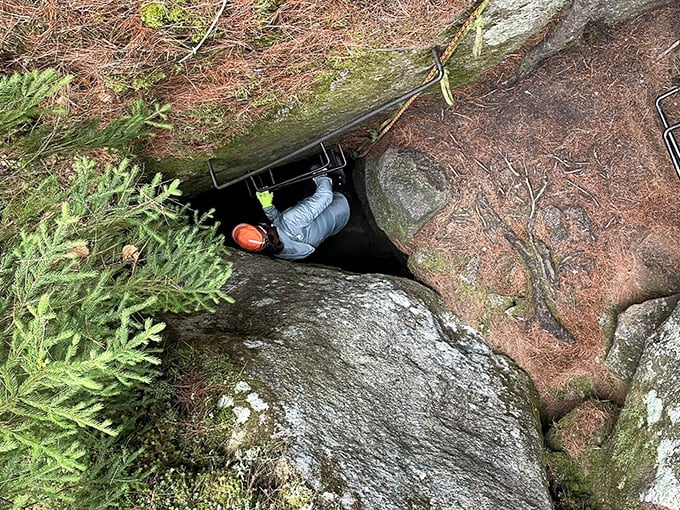 A hiker squeezes through one of the cave's tighter passages &ndash; claustrophobics beware, but thrill-seekers will find it worth every inch.