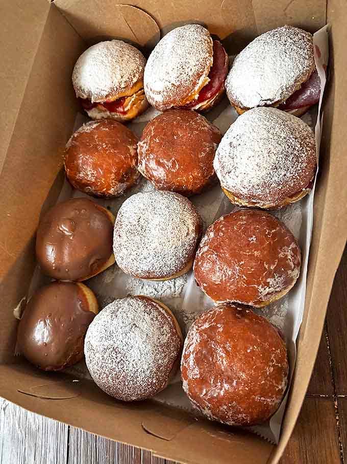Pączki paradise! These Polish donuts cause near-riots during pre-Lenten season, with pillowy dough housing sweet fillings that dreams are made of.