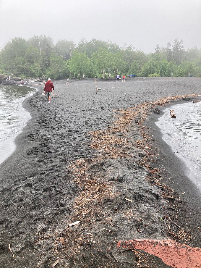 The path connecting the beach's two sections creates natural exploration opportunities, perfect for adventurous spirits of all ages.