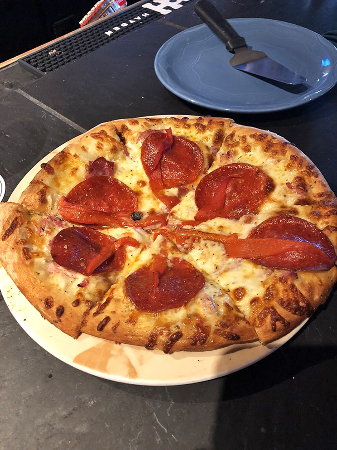 The brick oven creates pizza perfection with a crisp-yet-chewy crust and pepperoni that curls into little cups of savory goodness.