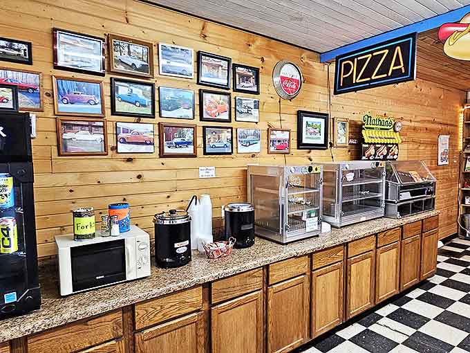 The snack bar area blends nostalgia with function &ndash; wooden paneling, classic car photos, and modern equipment create a timeless space for culinary magic.