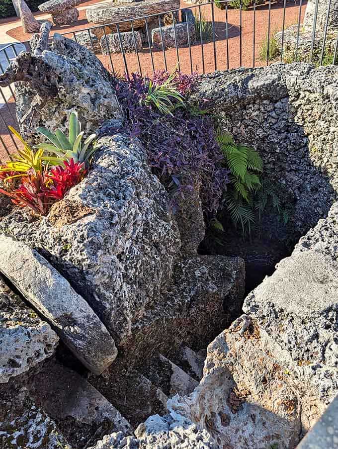 Descending these stairs feels like entering a secret world where one man's vision became solid reality, one carved step at a time.