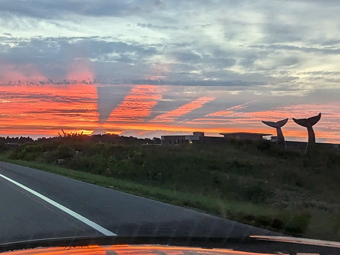 Sunset transforms these granite giants into silhouettes, their distinctive shapes unmistakable against the painted sky.