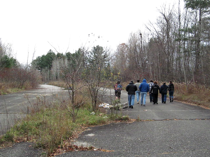 Nothing says "adventure" quite like a group of people willingly walking on a road that cars have wisely decided to avoid.