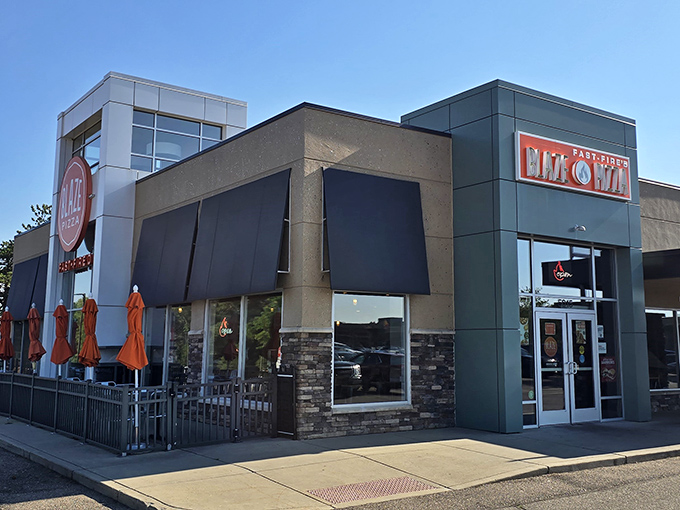 Blaze Pizza's modern storefront brings fast-fired artisanal pies to Lansing, where customization and speed meet surprisingly authentic flavor.