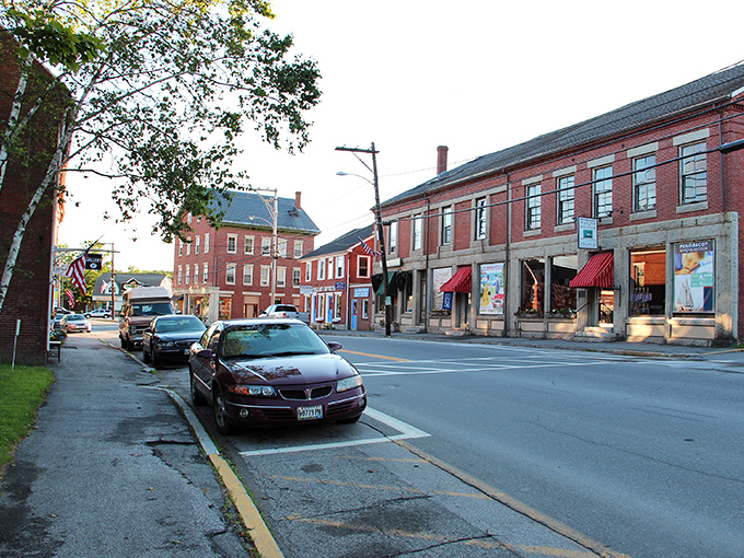 Searsport's historic main street showcases buildings that have stood for generations, including the distinctive Knox Bros. store with its vintage signage.